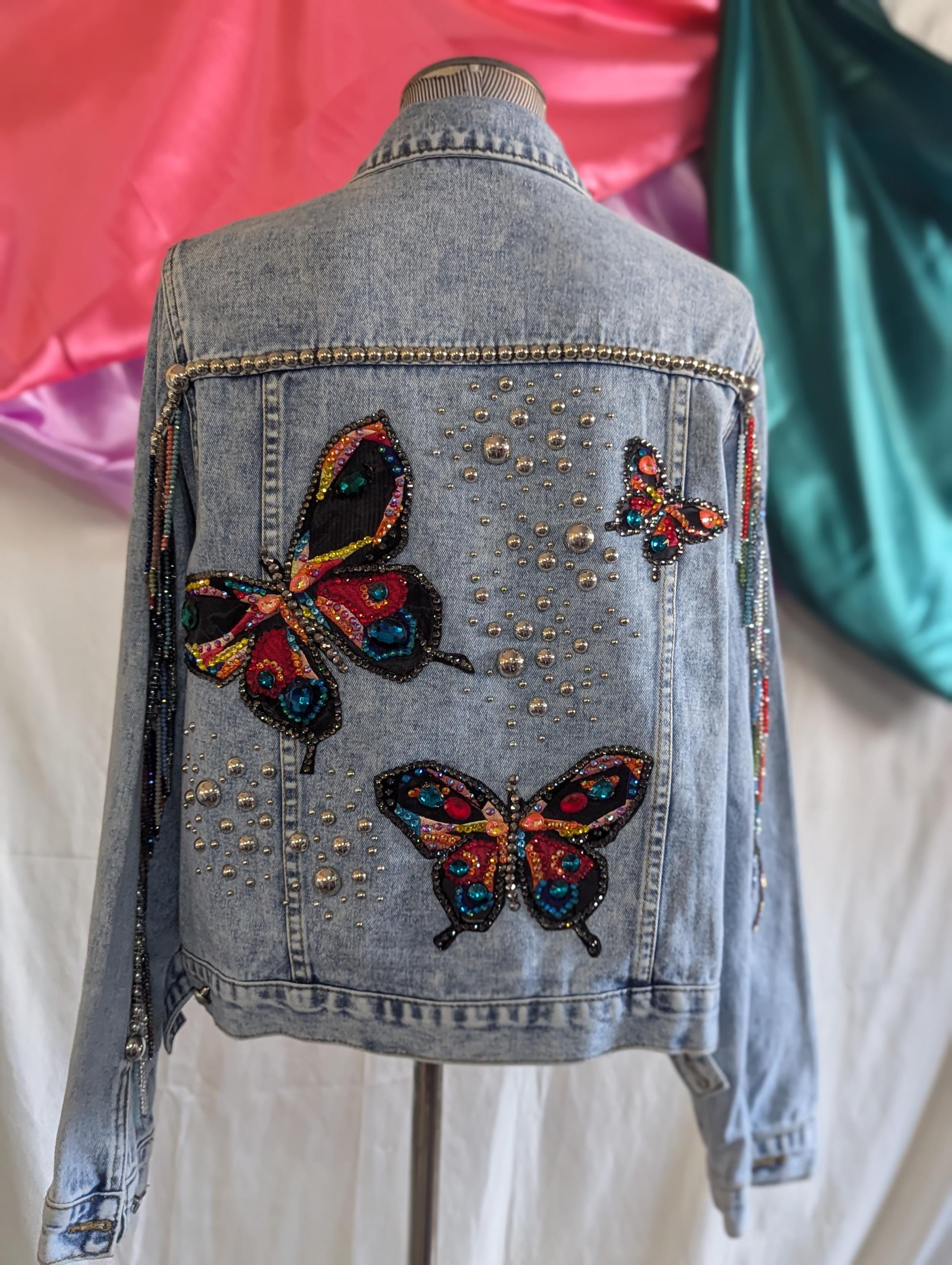 Three Modern Black Butterflies on a Light Blue Denim Jacket ...