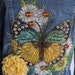 Yellow and Blue Butterfly With Daisies on a Light Blue Denim Jacket ...