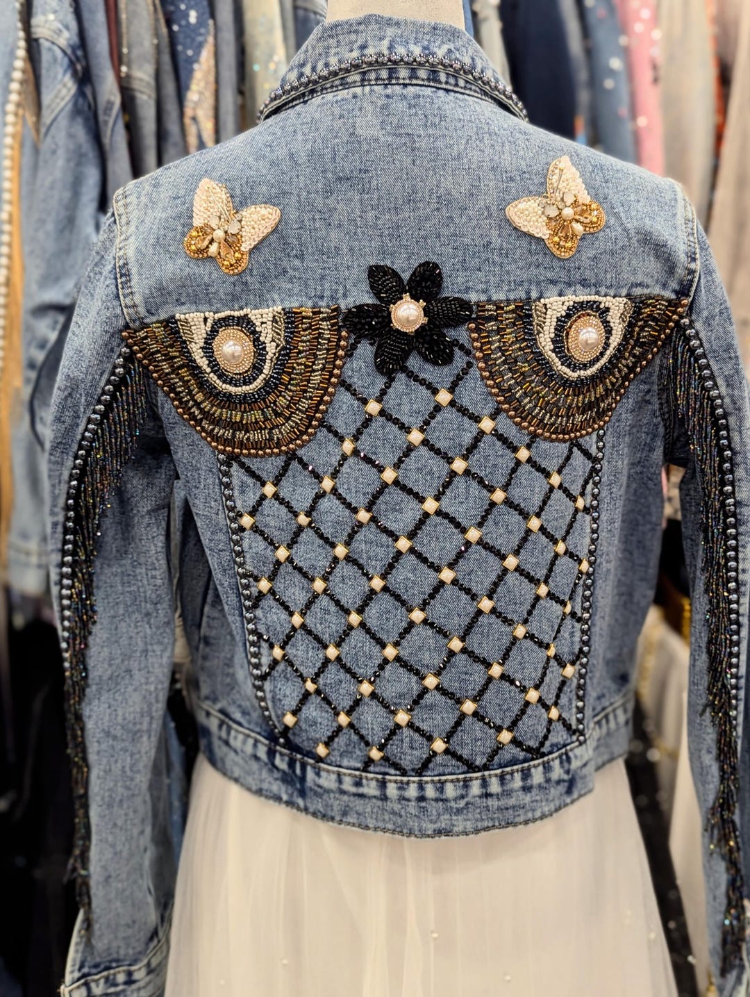 Two White Butterflies With a Black Flower on a Med Blue Denim Jacket ...