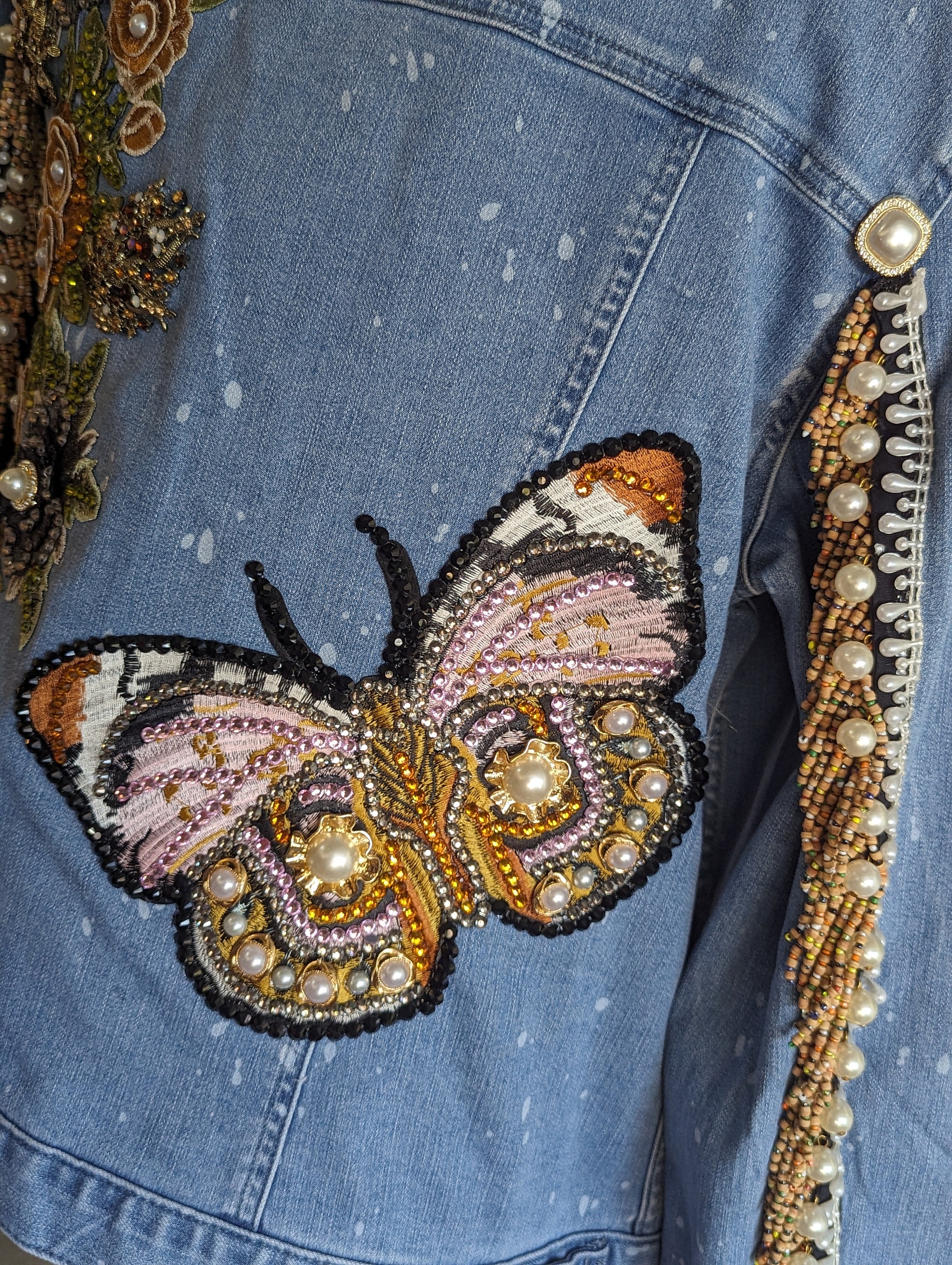 Brown Butterfly With Flowers on a Med Blue Denim Jacket. Embellished ...