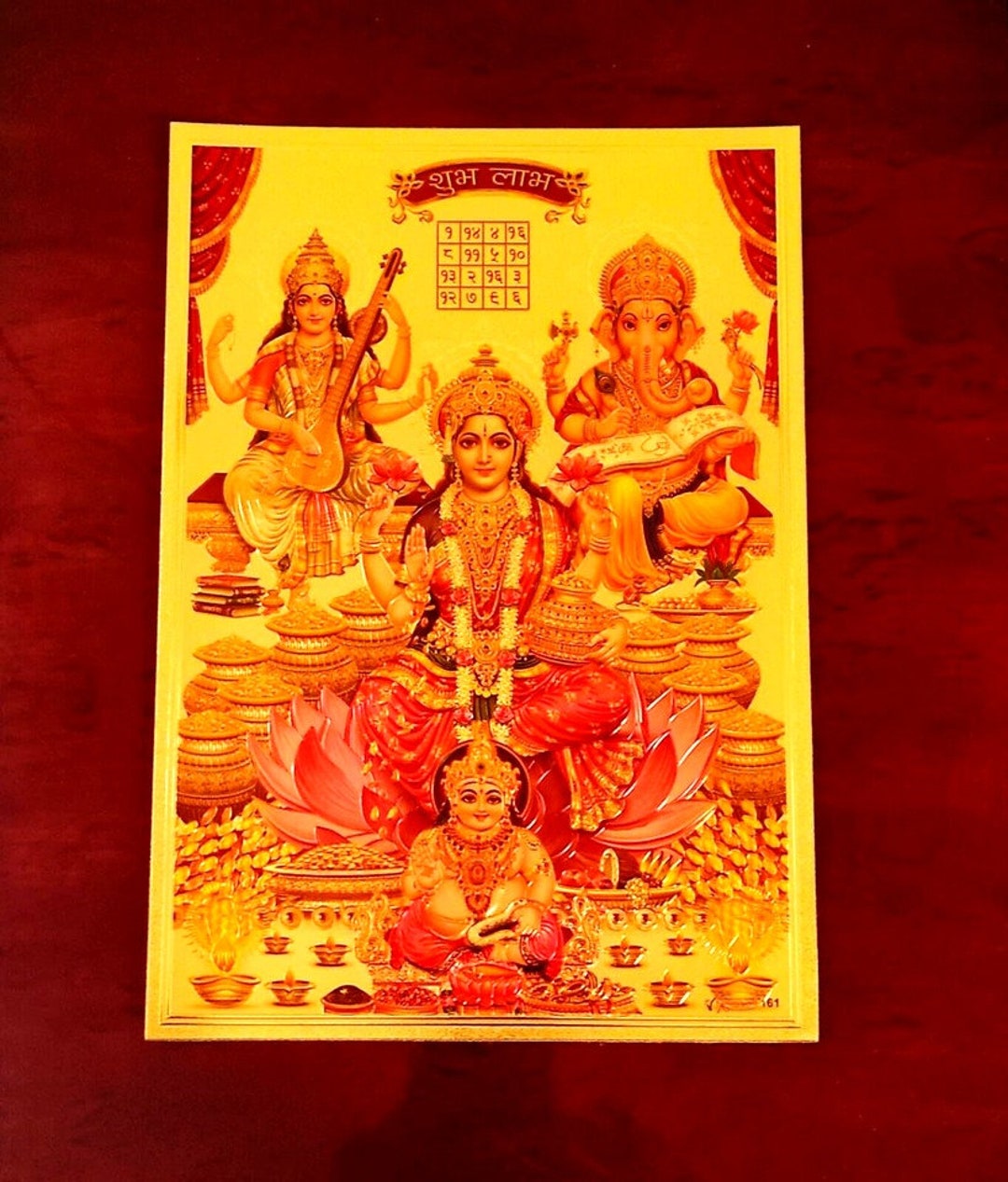 Mahalaxmi With Ganesh Saraswati and Kuber Ji Golden Foil Print Sheet ...