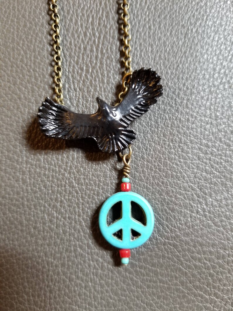 Raven in Flight Charm With Peace Sign. - Etsy