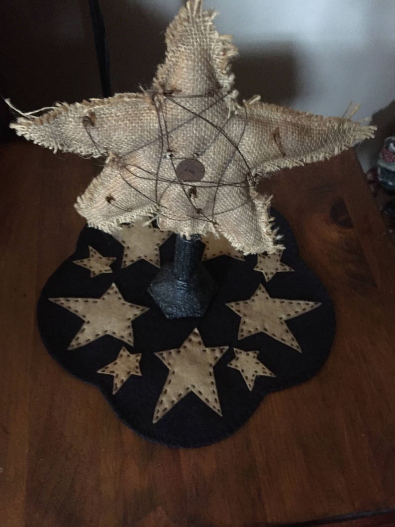 Star Candle Mat Measuring 12 Inches Across With a Black Background and ...