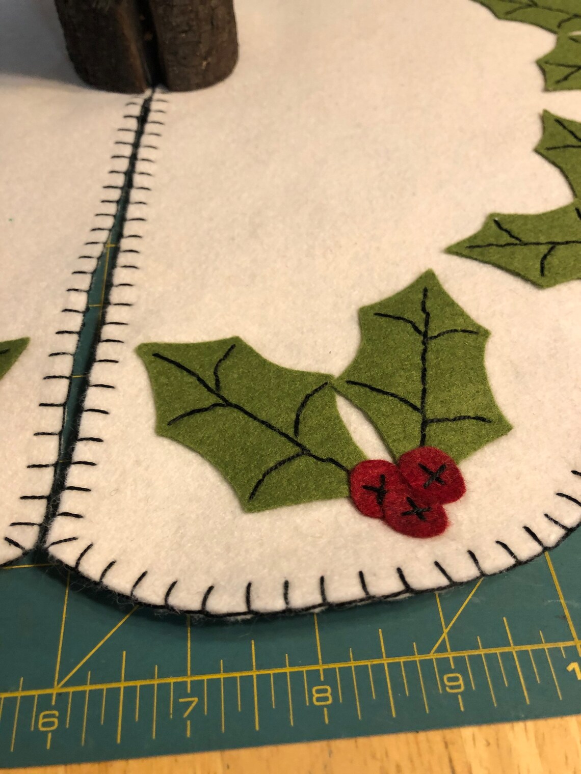 Primitive Holly Tree Skirt With an off White Background and Green Holly ...