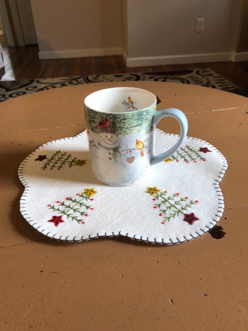 Feather Tree Candle Mat Shown on an off White Background Measuring 12 ...