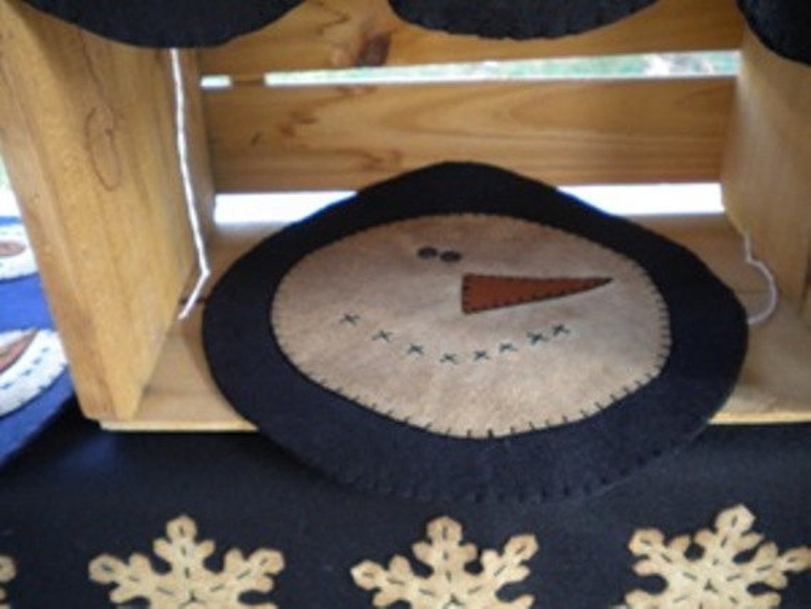 Candle Mat With a Snowman Face Stitched on a Black Background Measuring ...