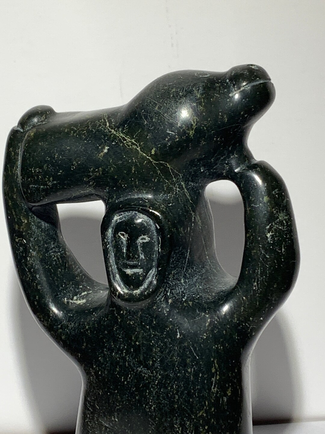 Inuit Art Carving Sculpture, Inuk Holding Seal Aloft, Signed in ...