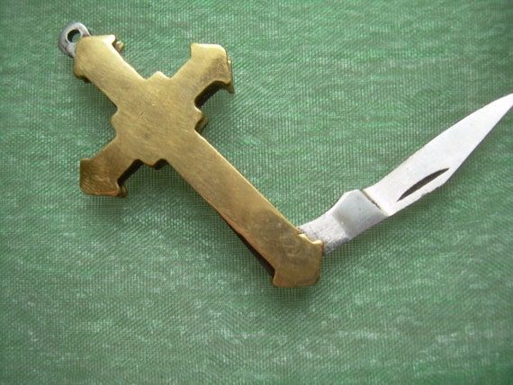 Hidden Knife Cross Pendant