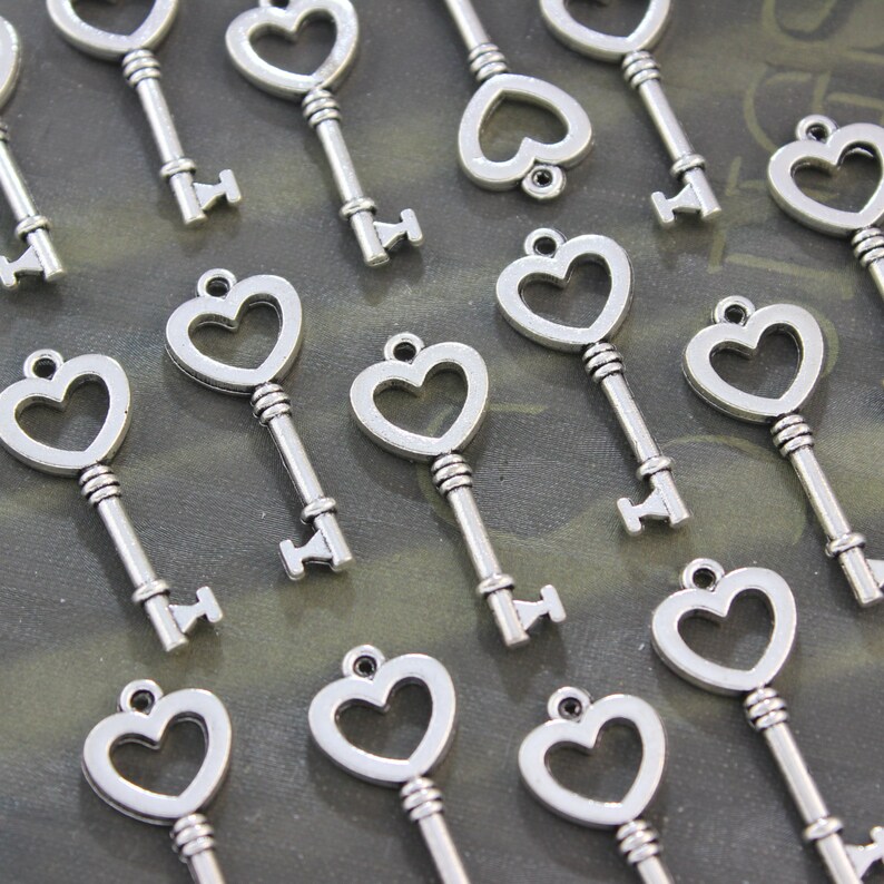 50 Pcs Small Antique Silver Double Sided Skeleton Key Charm - Etsy