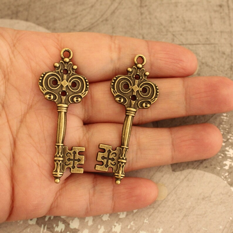 10 Pcs Antique Brass Double Sided Skeleton Key Charm - Etsy