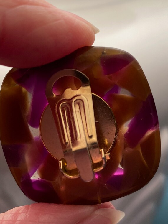 Mottled Brown Shades Of Purple And Clear Translucent Gem