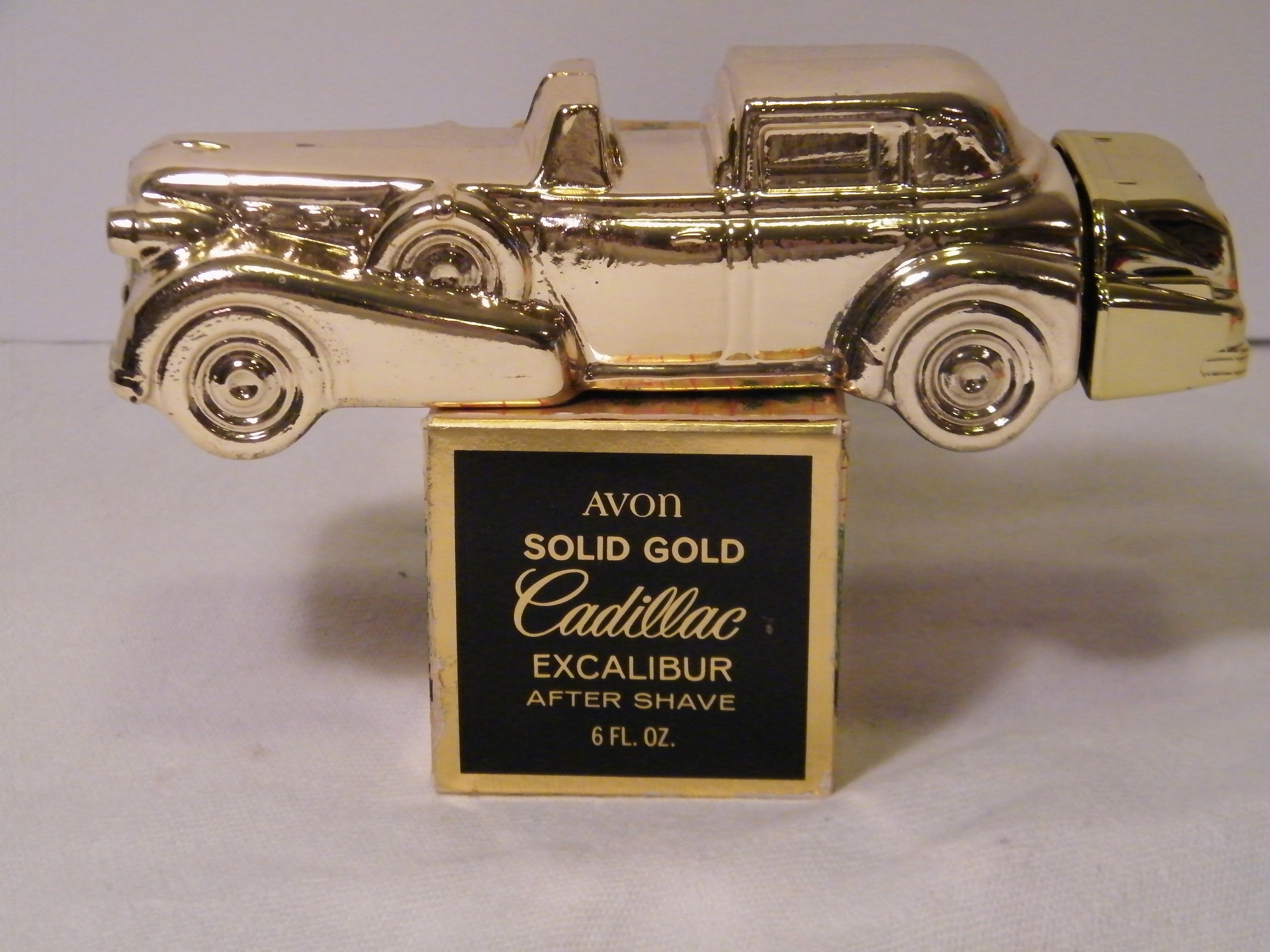 Avon Solid Gold Cadillac Glass Car Decanter FULL of Excaliber - Etsy