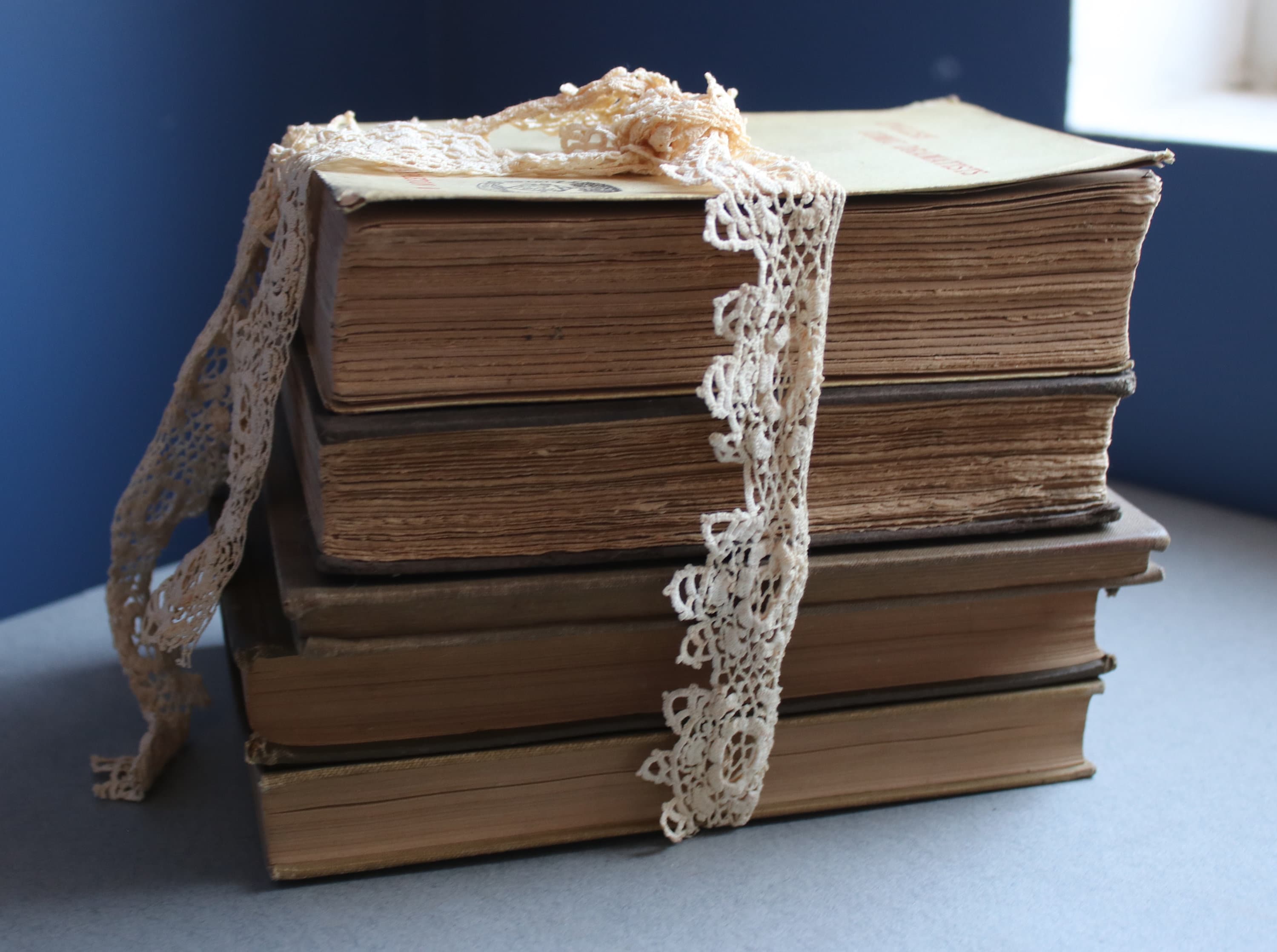 Stack of Antique Books in Neutral Colors