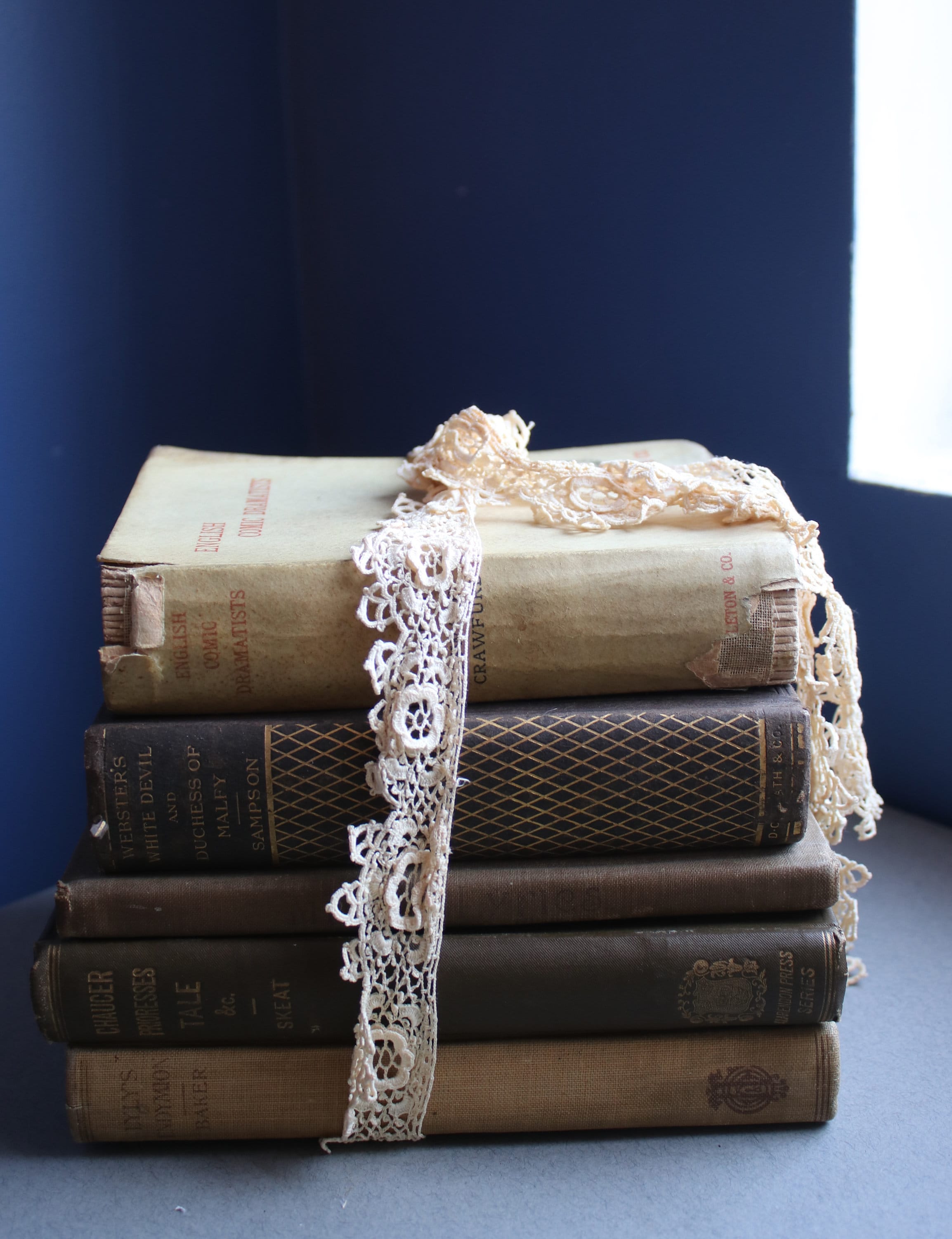Stack of Antique Books in Neutral Colors