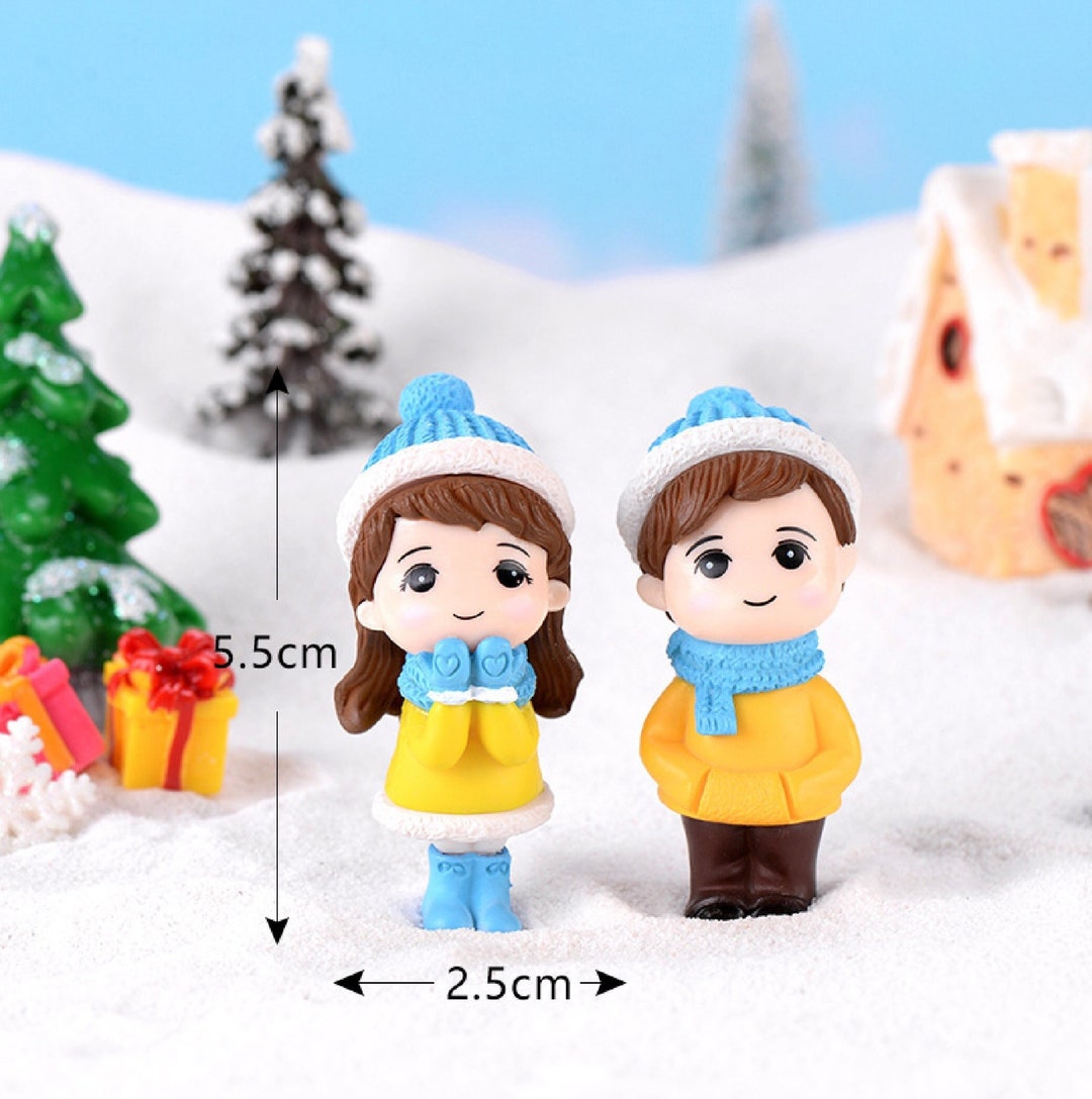 Winter Burnette Couple Miniature Figurines With a Boy and a Girl in a ...