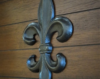 Cast iron wall decor | Etsy