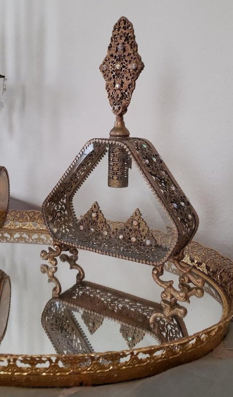 Gold Filigree Triangular-shape Perfume Bottlestylebiltormoluhollywood ...