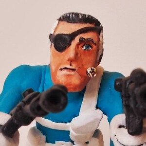 Styled on the Vintage: Cigar Smokin' Nick Fury Storming | Etsy