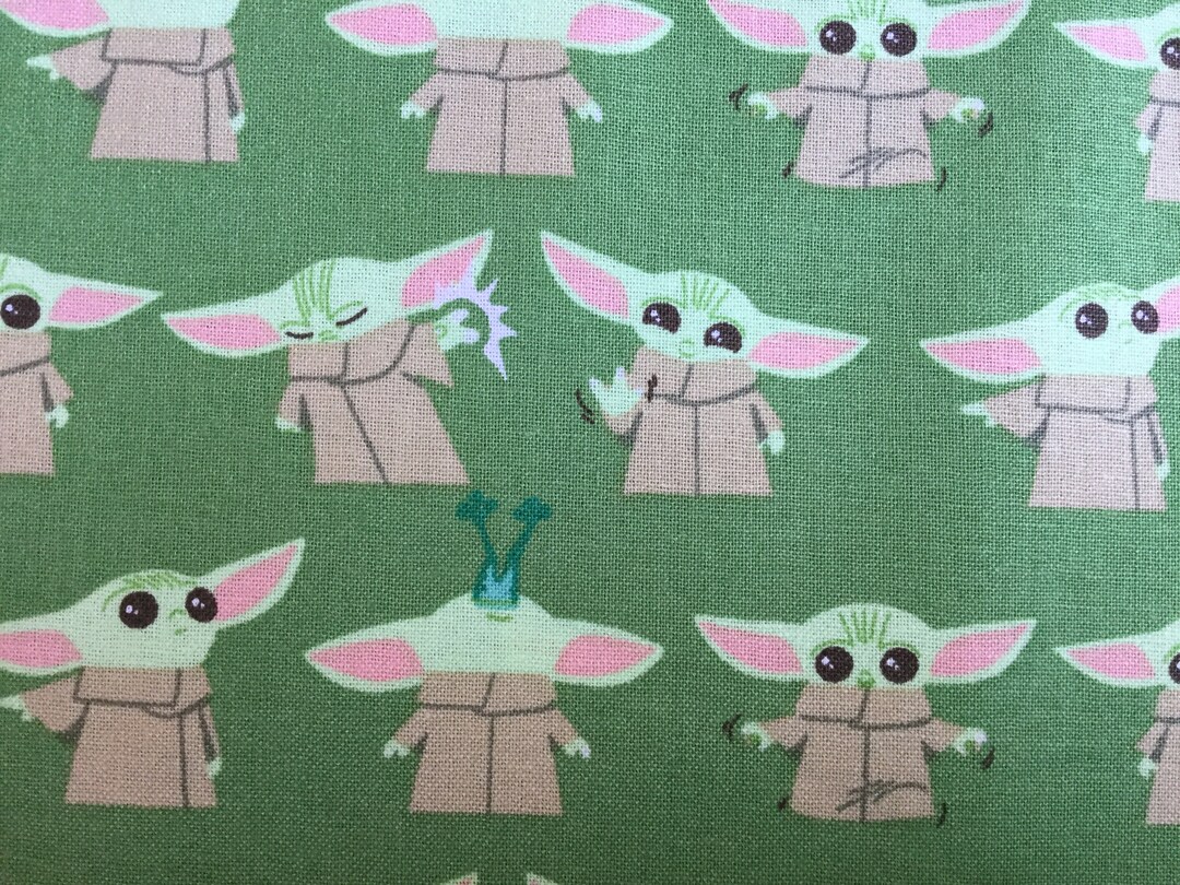 Mandalorian Din Grogu Green Background by Lucasfilm for Camelot Fabrics ...