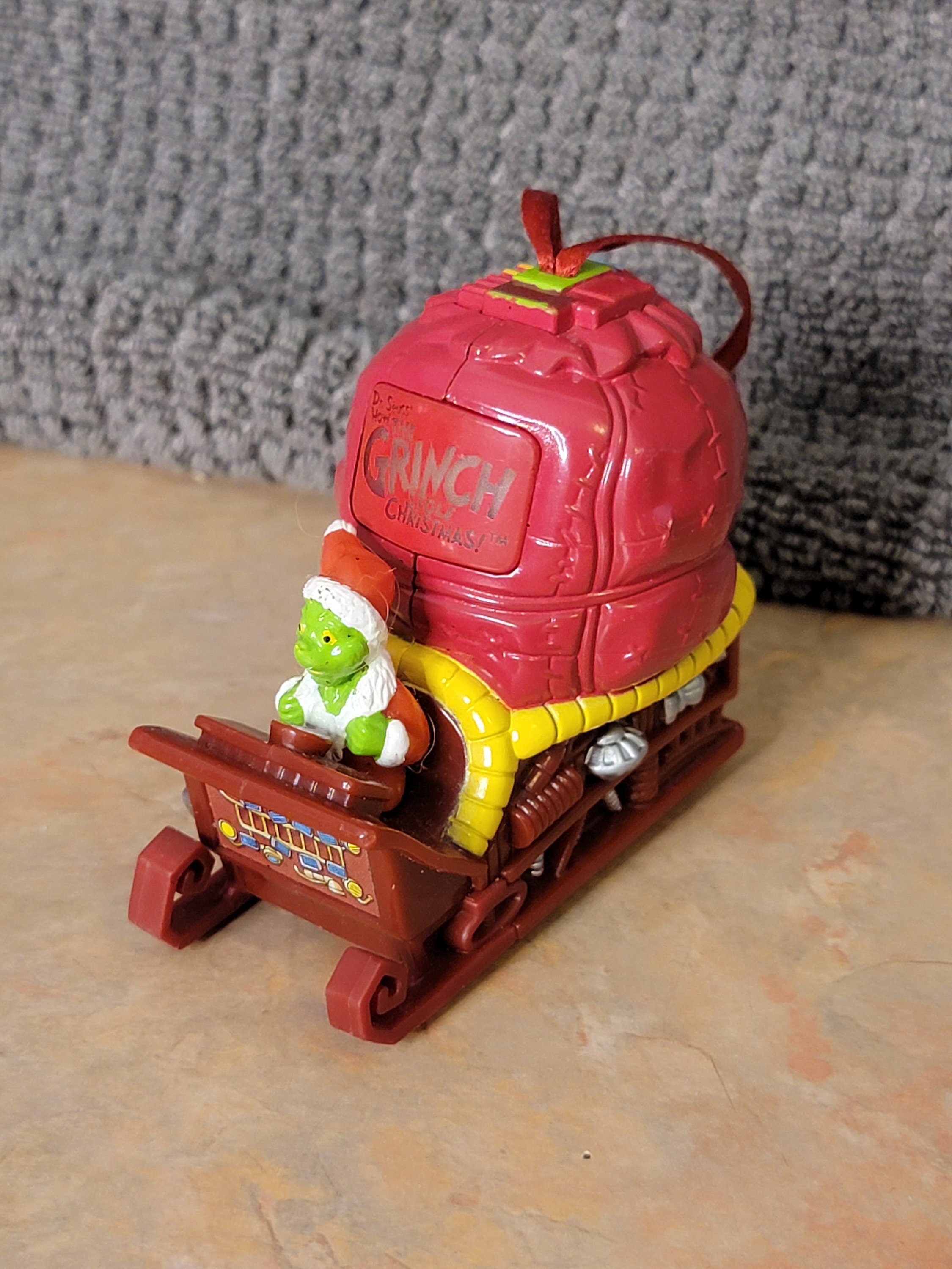 Grinch Holding Sleigh