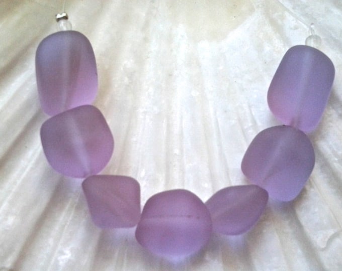 1 Strand (7 Pcs.) Frosted Periwinkle Changes Small Center Drilled Sea ...