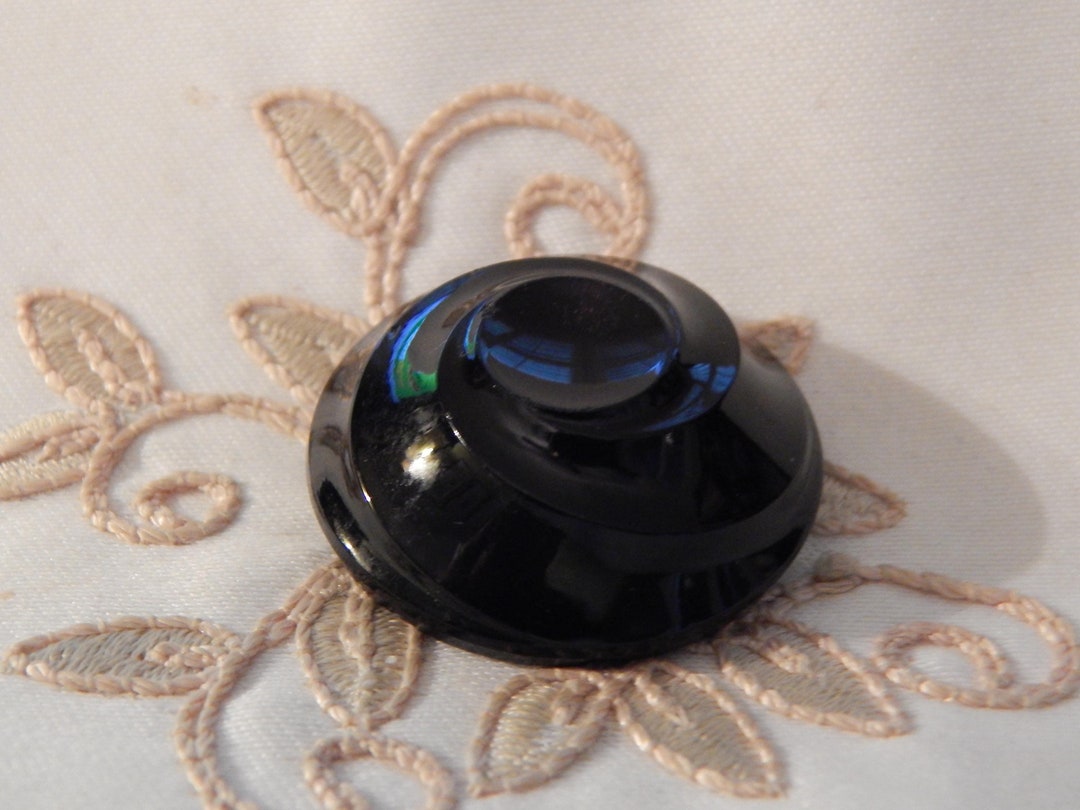 Mounded Black Glass Button With a Center Well and Swirling Glass Design ...