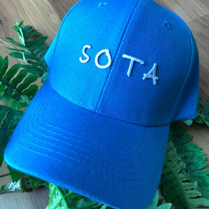 Sota Hat. Minnesota. MN. Heather Gray. Embroidered Trucker 32. Camo ...