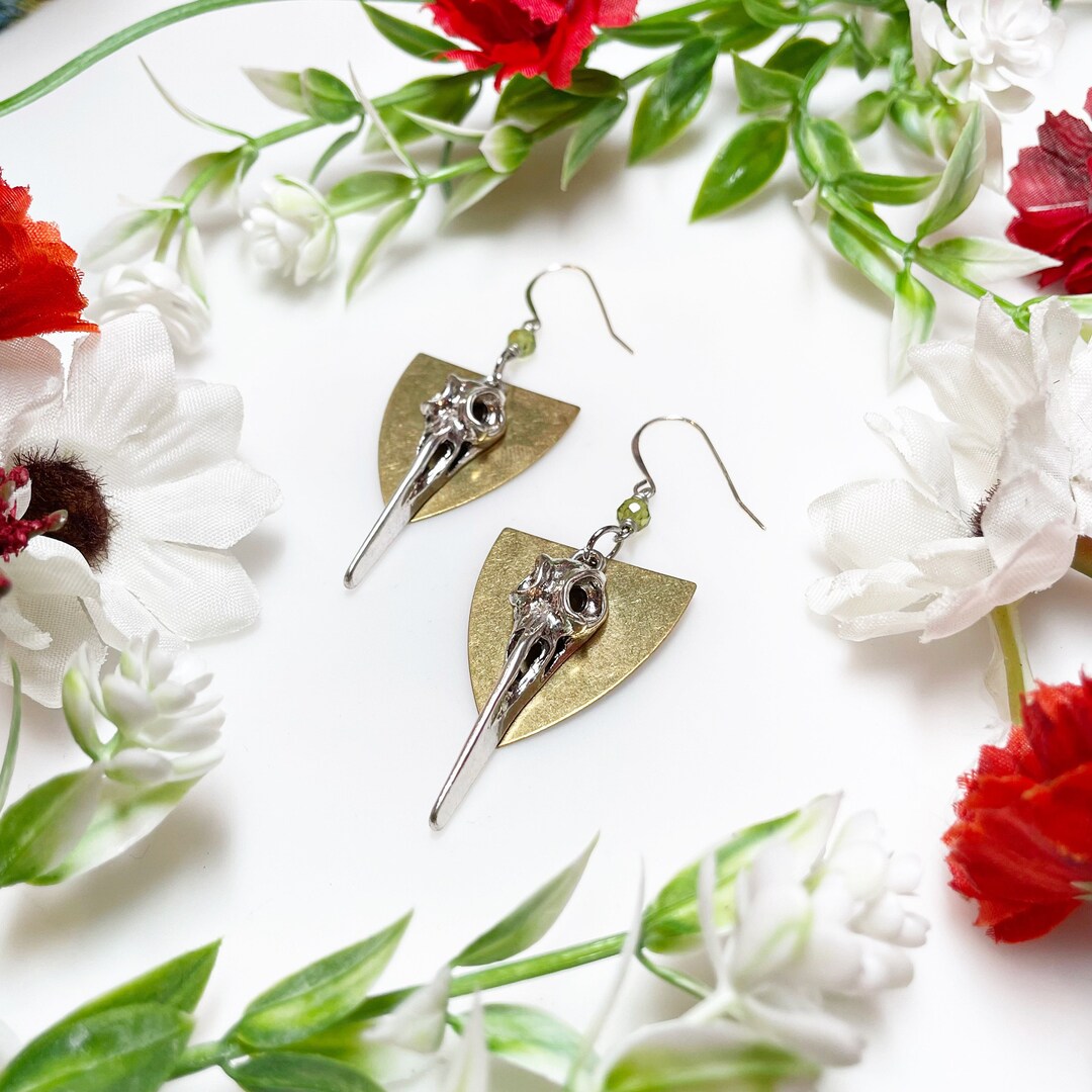 Dual Tone Hummingbird Skull Shield Earrings • Green Peridot Accent ...