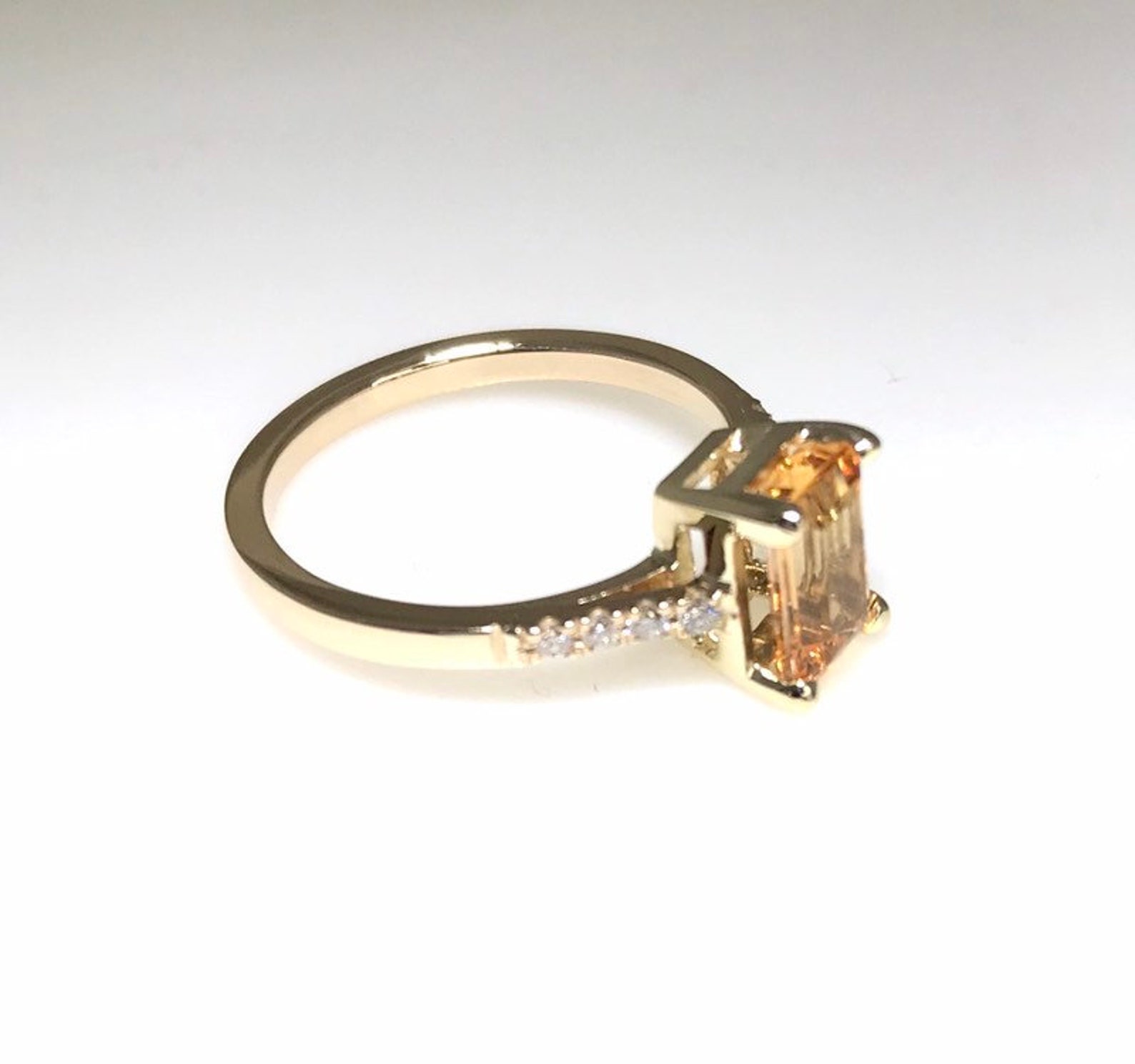 1,28 Carats Imperial Topaz Emerald Cut in Center and 0,08 Carats ...