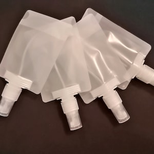 50ml Plastic Spray Bag Slim Spray Bag Liquid Spray Bottle Stylish Clear ...