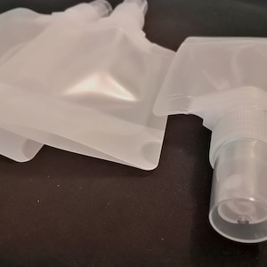 50ml Plastic Spray Bag Slim Spray Bag Liquid Spray Bottle Stylish Clear ...
