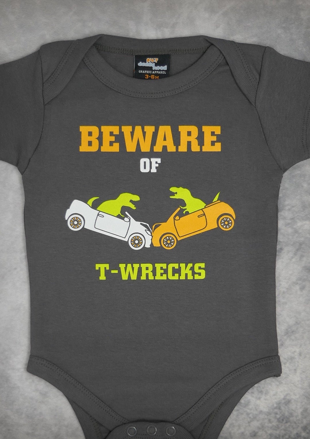 Beware of T-wrecks - Funny T-rex Dinosaur Crashing Cars Baby Charcoal ...