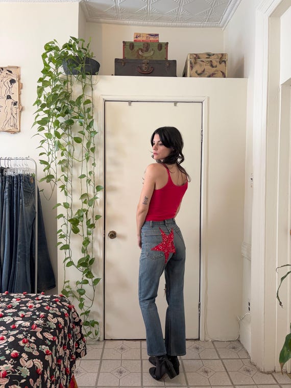 1970s distressed denim flares with star patch - Gem