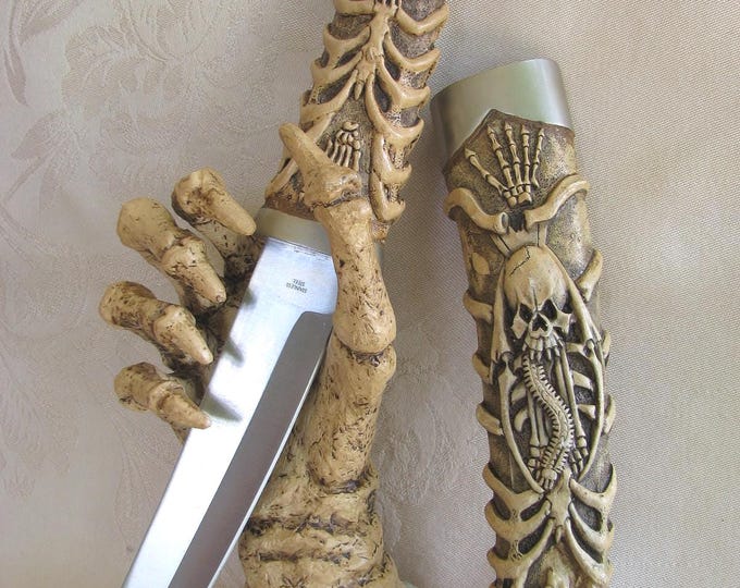 Skeleton~hand~holding~tanto~knife~dagger~sheath Decorated W/ Skeletons ...