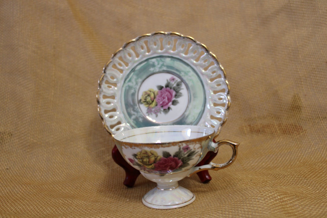 Green and White Footed Lusterware Tea Cup and Pierced Saucer With Pink ...