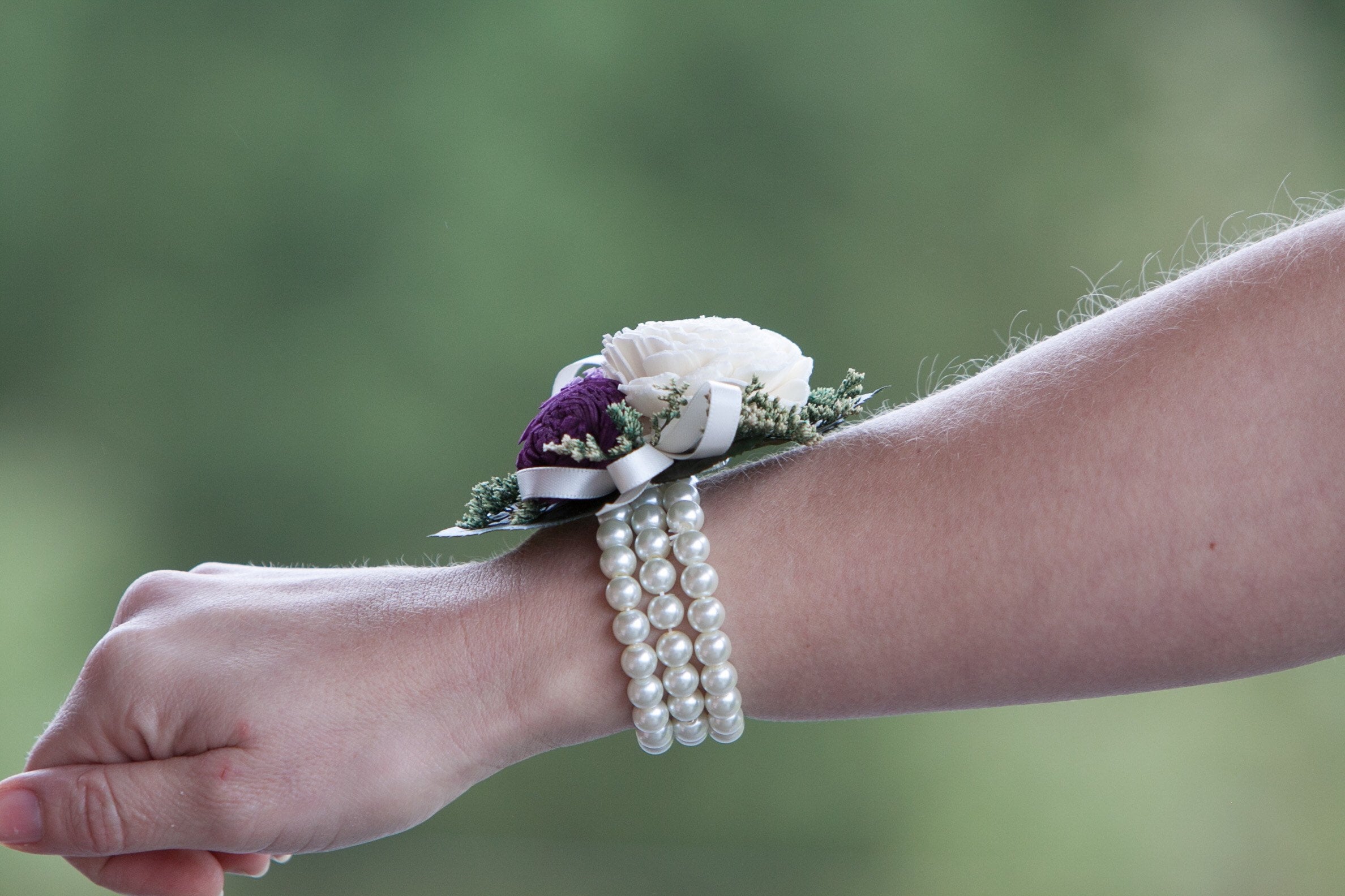 Woman's Purple and Ivory Beaded Wristlet Corsage