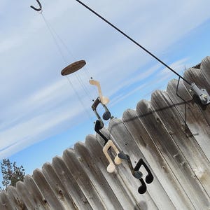 This Beautiful Glass Music Note Wind Chime Will Look Wonderful in Your ...