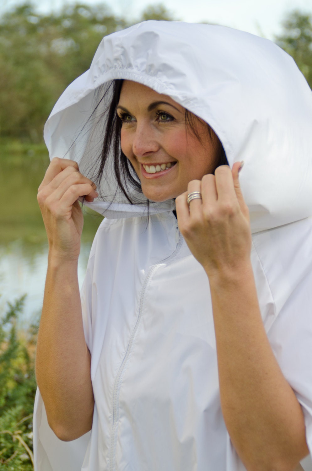 A Quirky Waterproof Bridal Cloak to Protect a Bride and Her Wedding ...