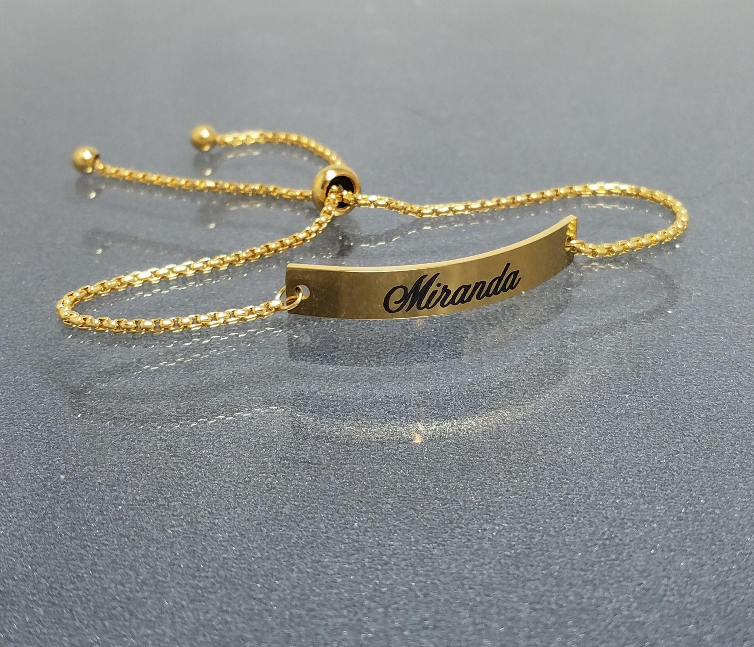 Gold plated name bracelet store