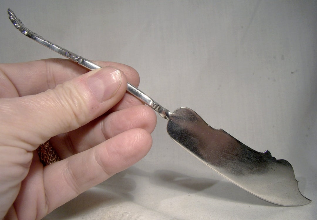 Rogers Raphael Silver Plate 7-1/2" Flat Twist Handle Butter Knife 1896 ...