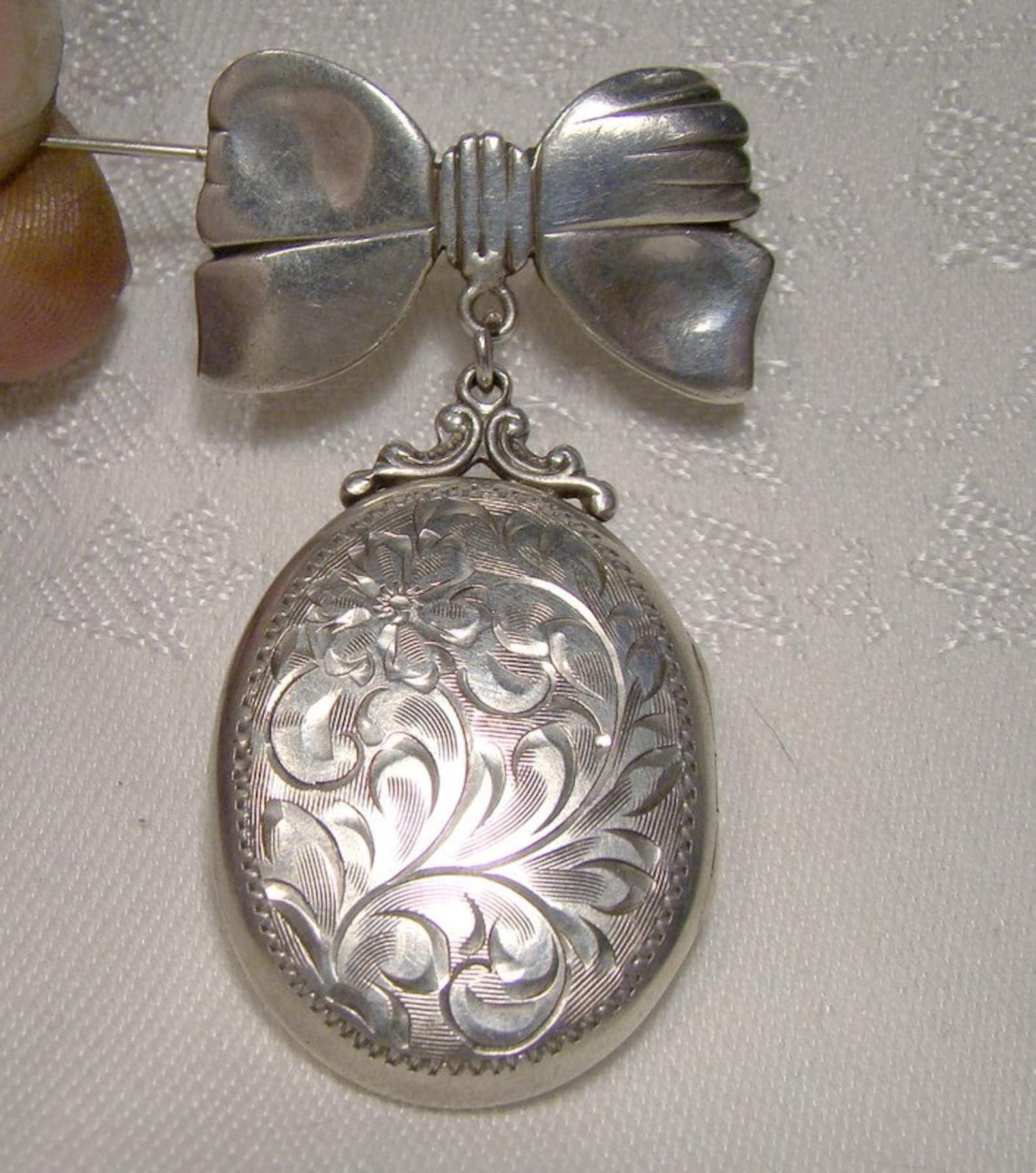 Sterling Silver Bow Brooch With Hand Engraved Oval Photo Locket 1940s ...