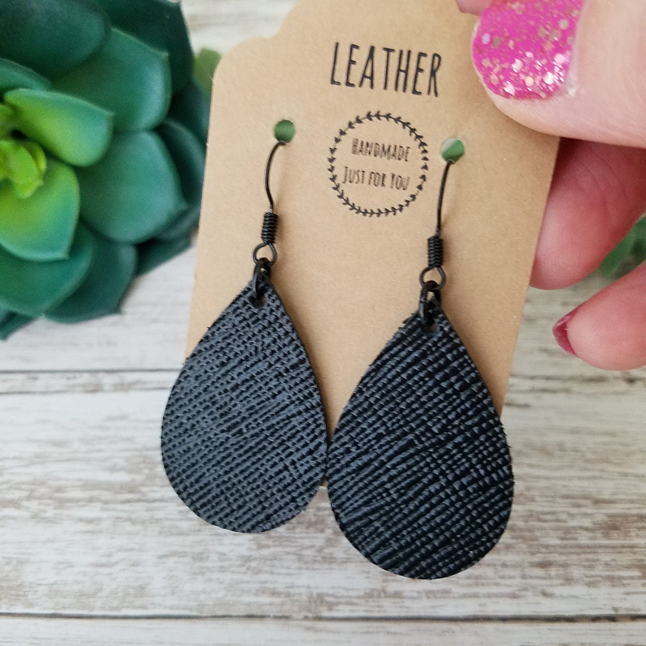 Black leather earrings store