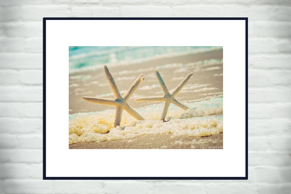 Two Starfish On Beach