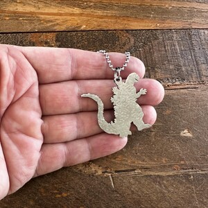 Godzilla 1954 Necklace Hammered Texture Pendant Movie Monsters Fan ...