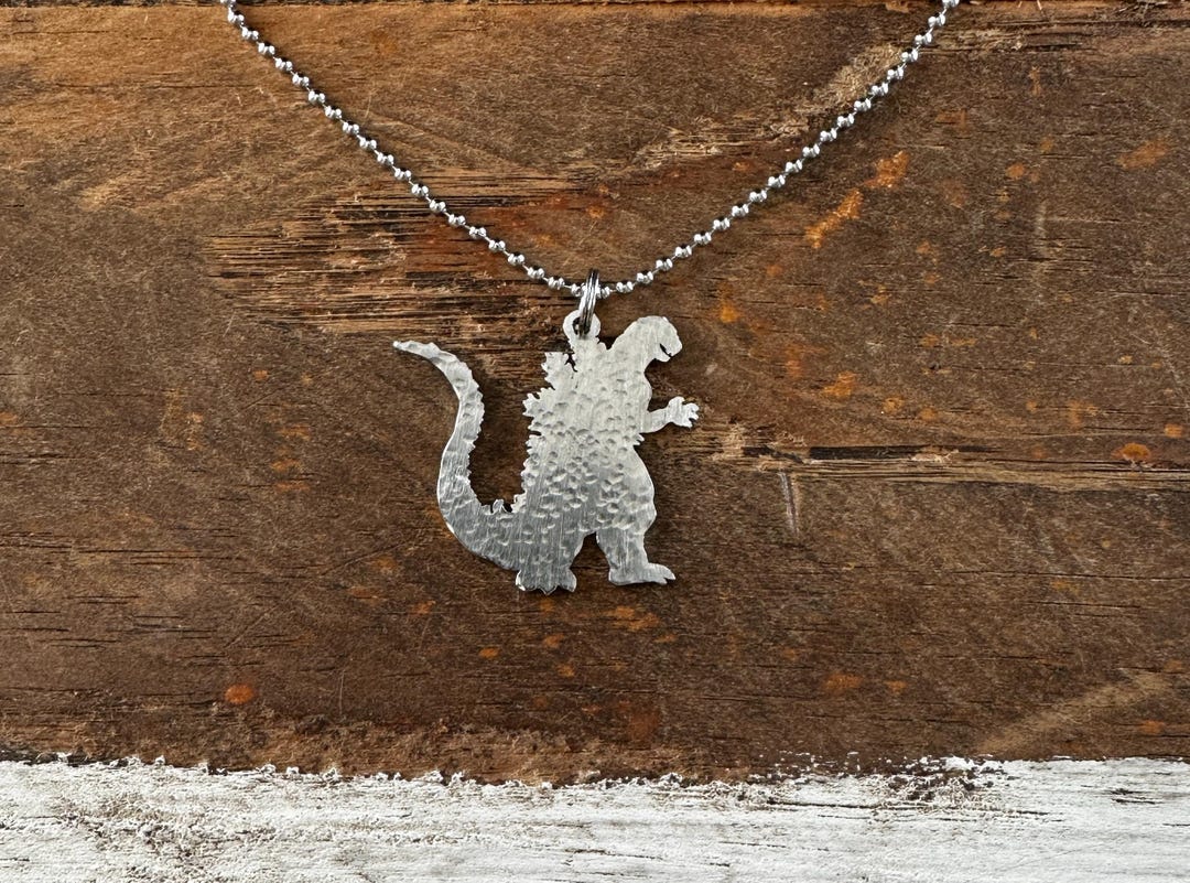Godzilla 1954 Necklace Hammered Texture Pendant Movie Monsters Fan ...