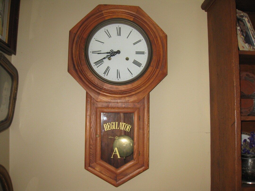 Schoolhouse Pendulum Wall Clock at Karima Parker blog