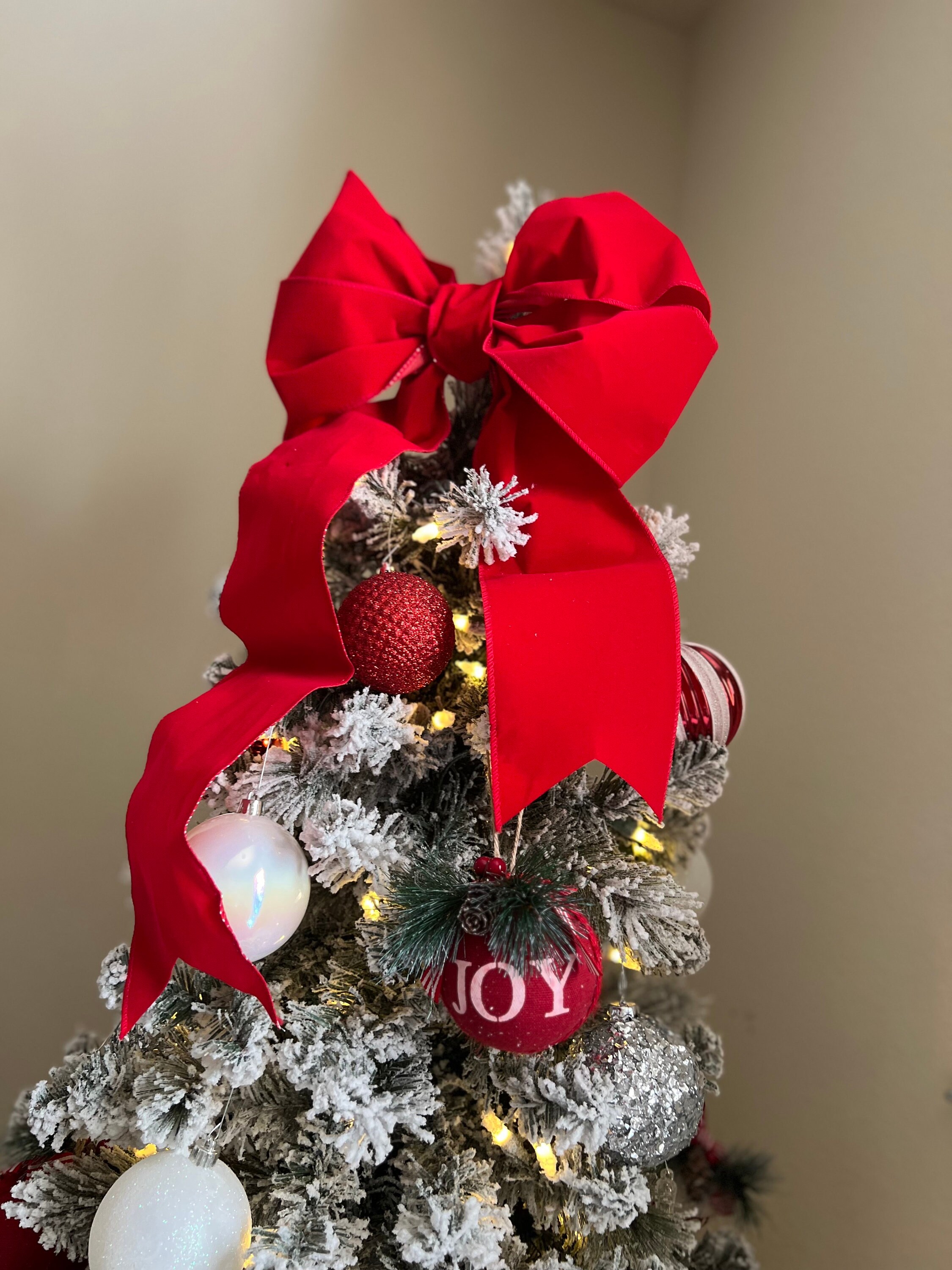 Bow tree topper store