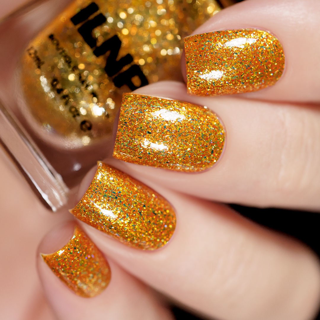 Metallic Gold Nail Polish With Glitter