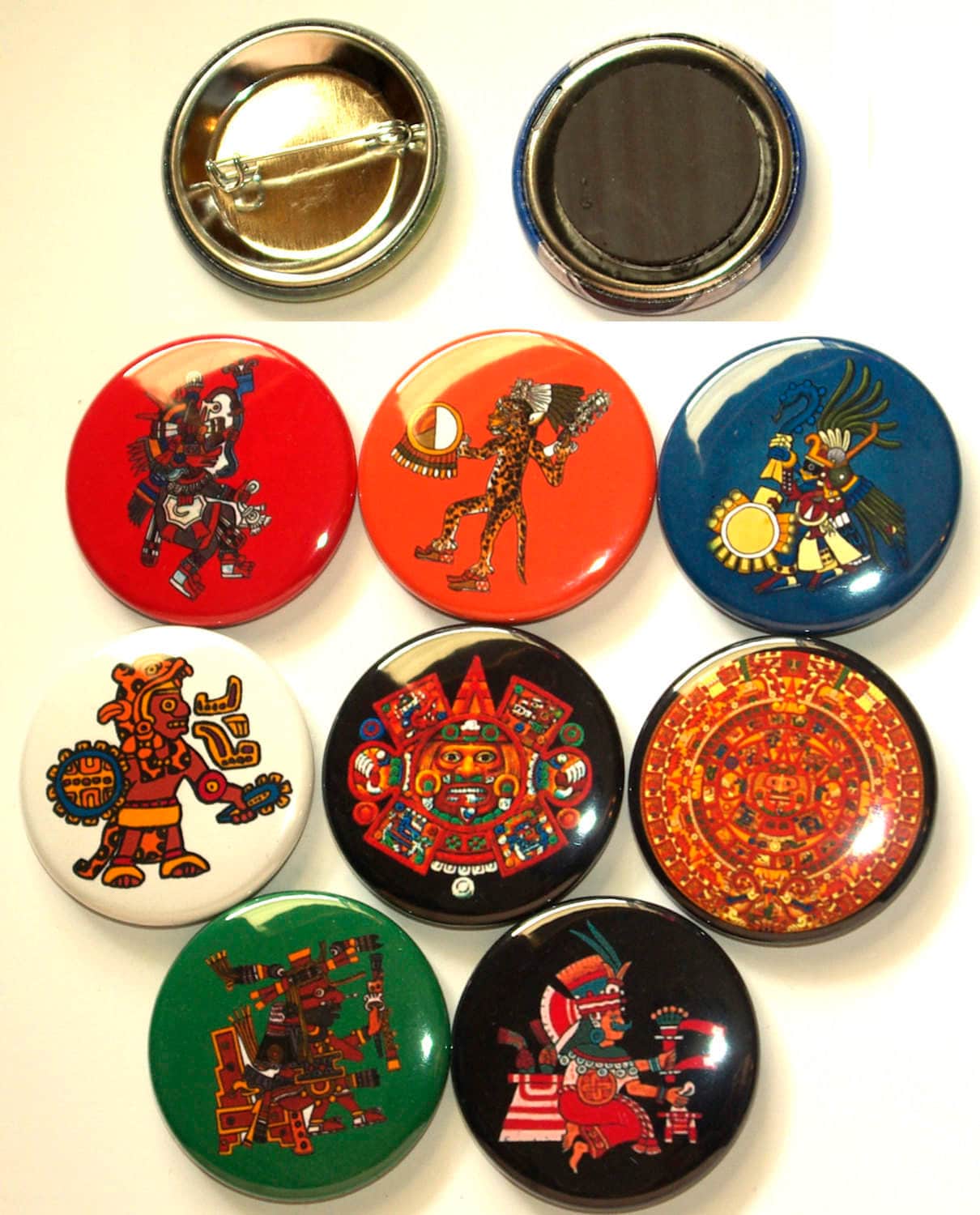 8 Aztec Buttons. Your choice of pinbacks, flatbacks or magnet buttons