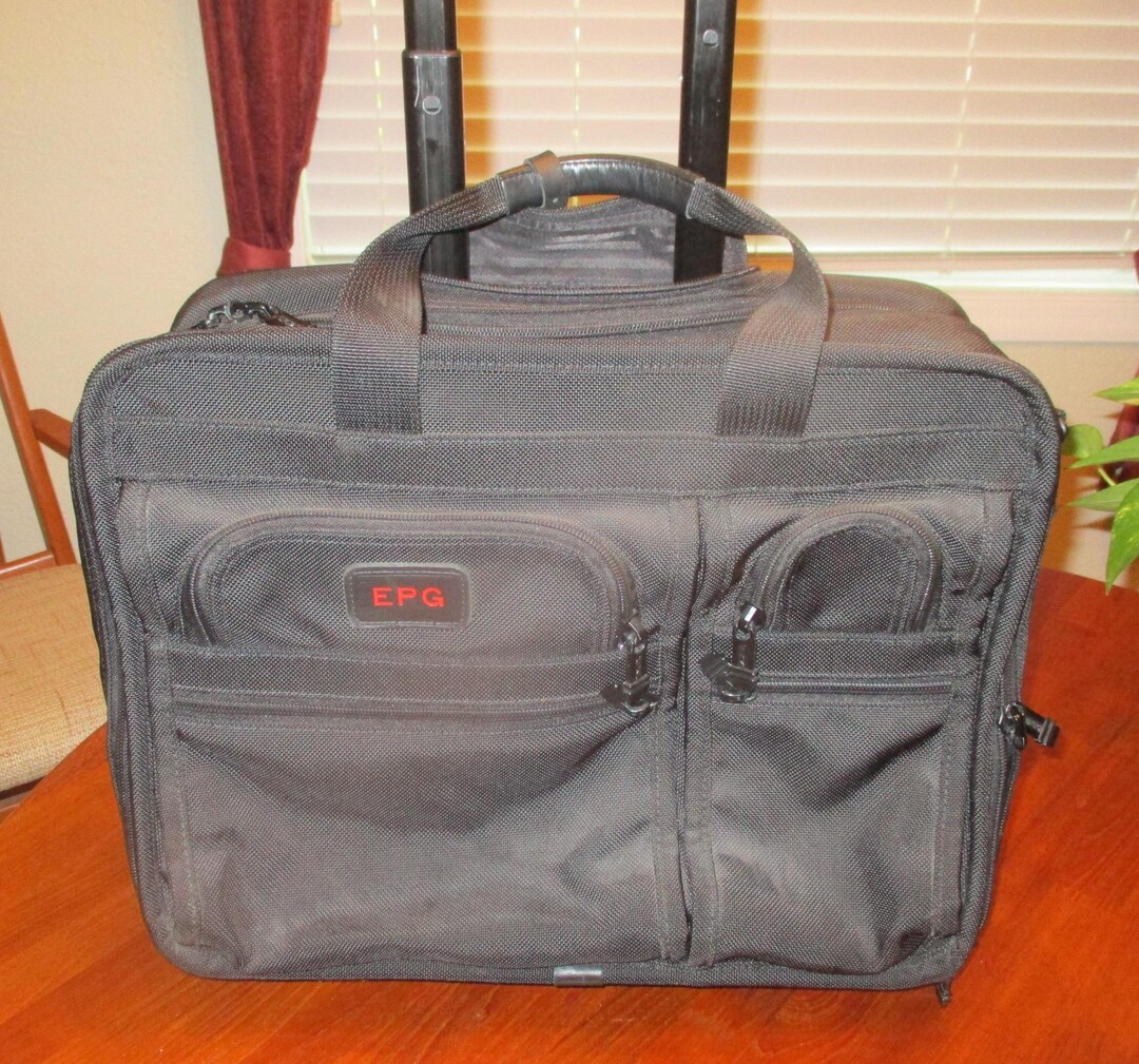Vintage TUMI TRAVEL BAG Wheels Telescoping Handle Identification Tag - Etsy